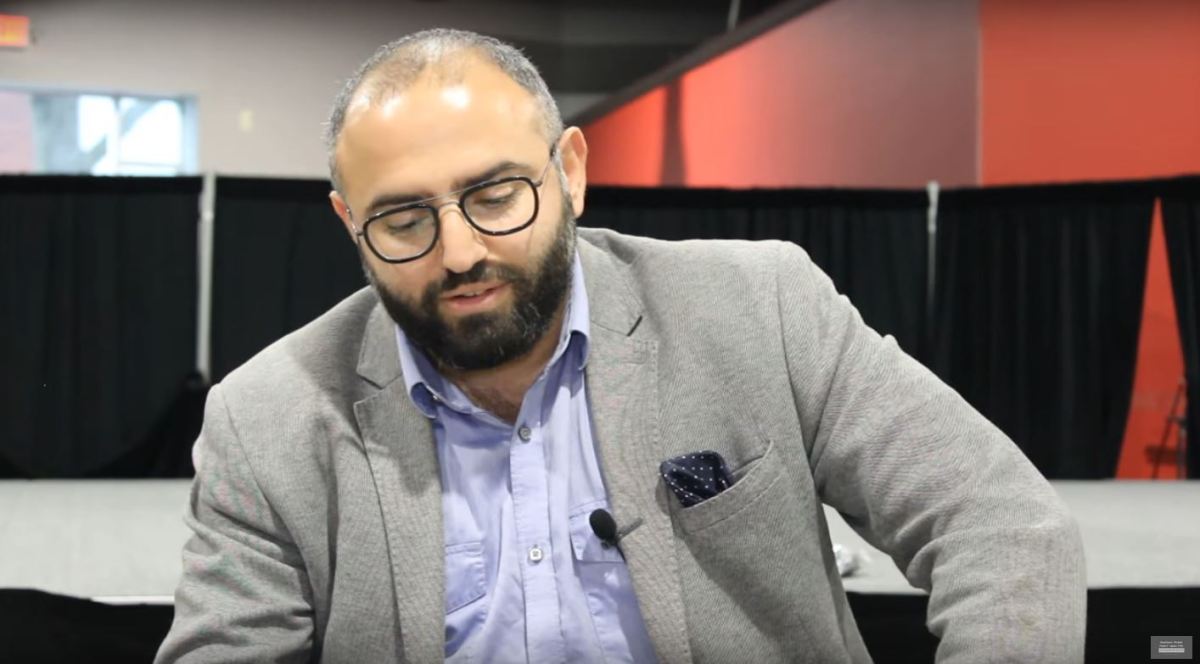 Wissam Charafeddine recites Color of Life at Dearborn Open Mic ...